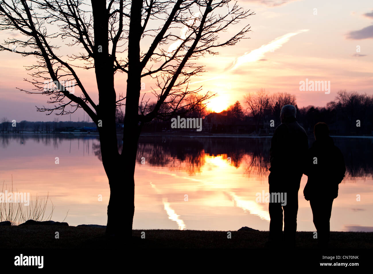 Watching the sunset Stock Photo - Alamy