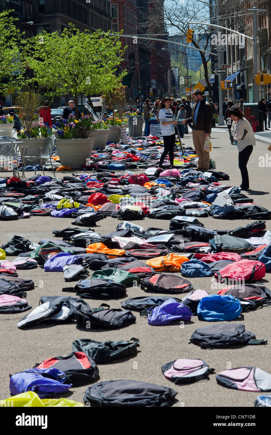 Hundreds of backpacks are displayed in New York on Thursday, April 5 ...
