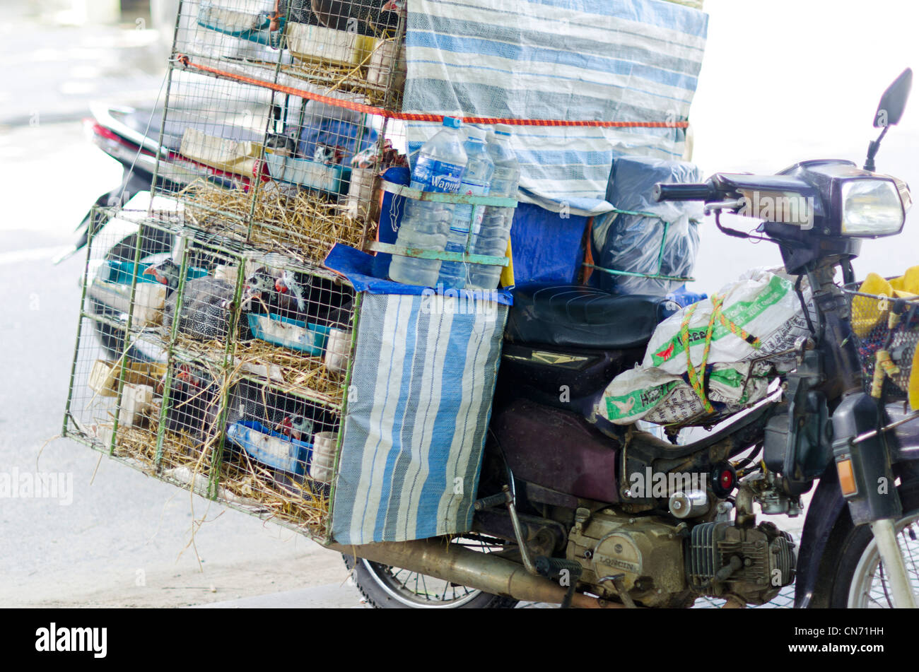 Heavily loaded motorbike hi-res stock photography and images - Alamy