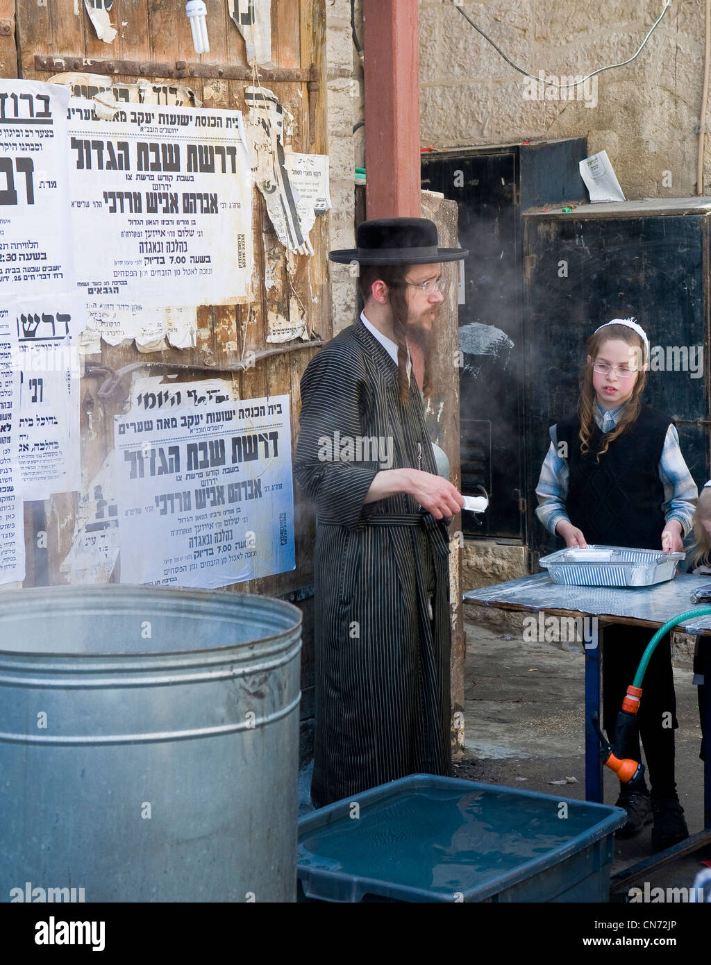 An Ultra Orthodox man is preparing to the Jewish holiday of Passover by ...