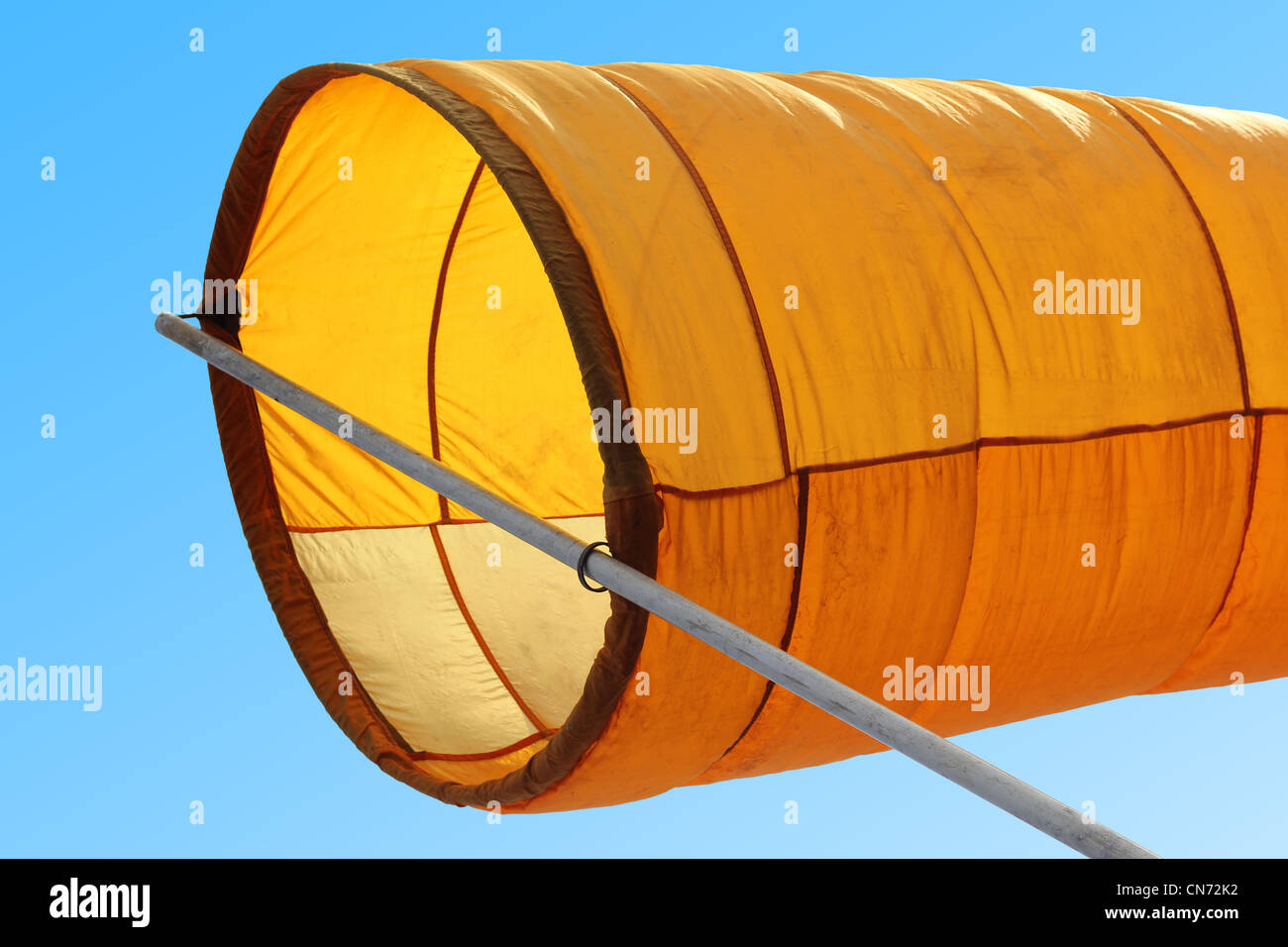 Wind direction Flag on blue cloud sky in wind Stock Photo - Alamy