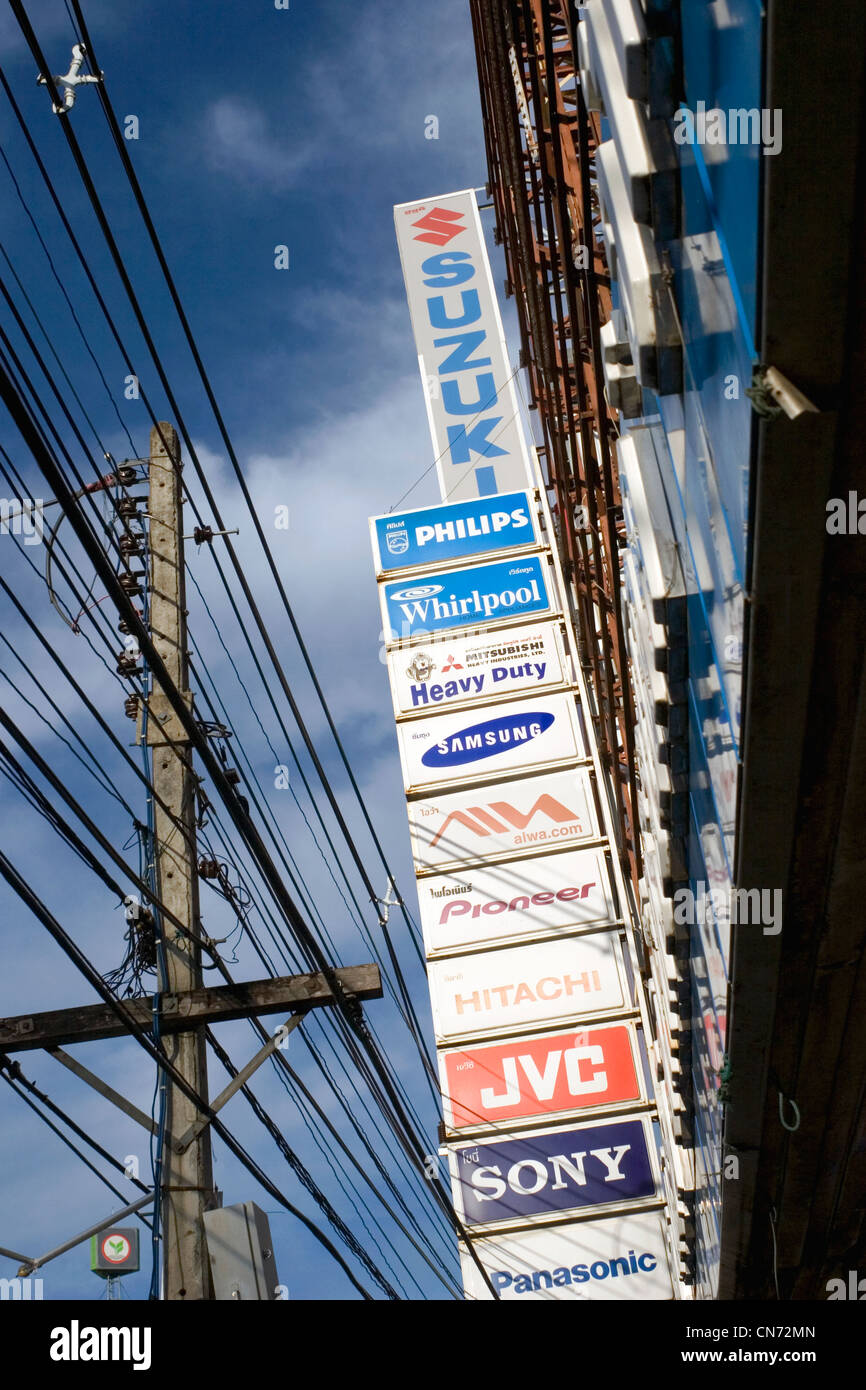 Many signs advertising various brands are part of the urban landscape ...