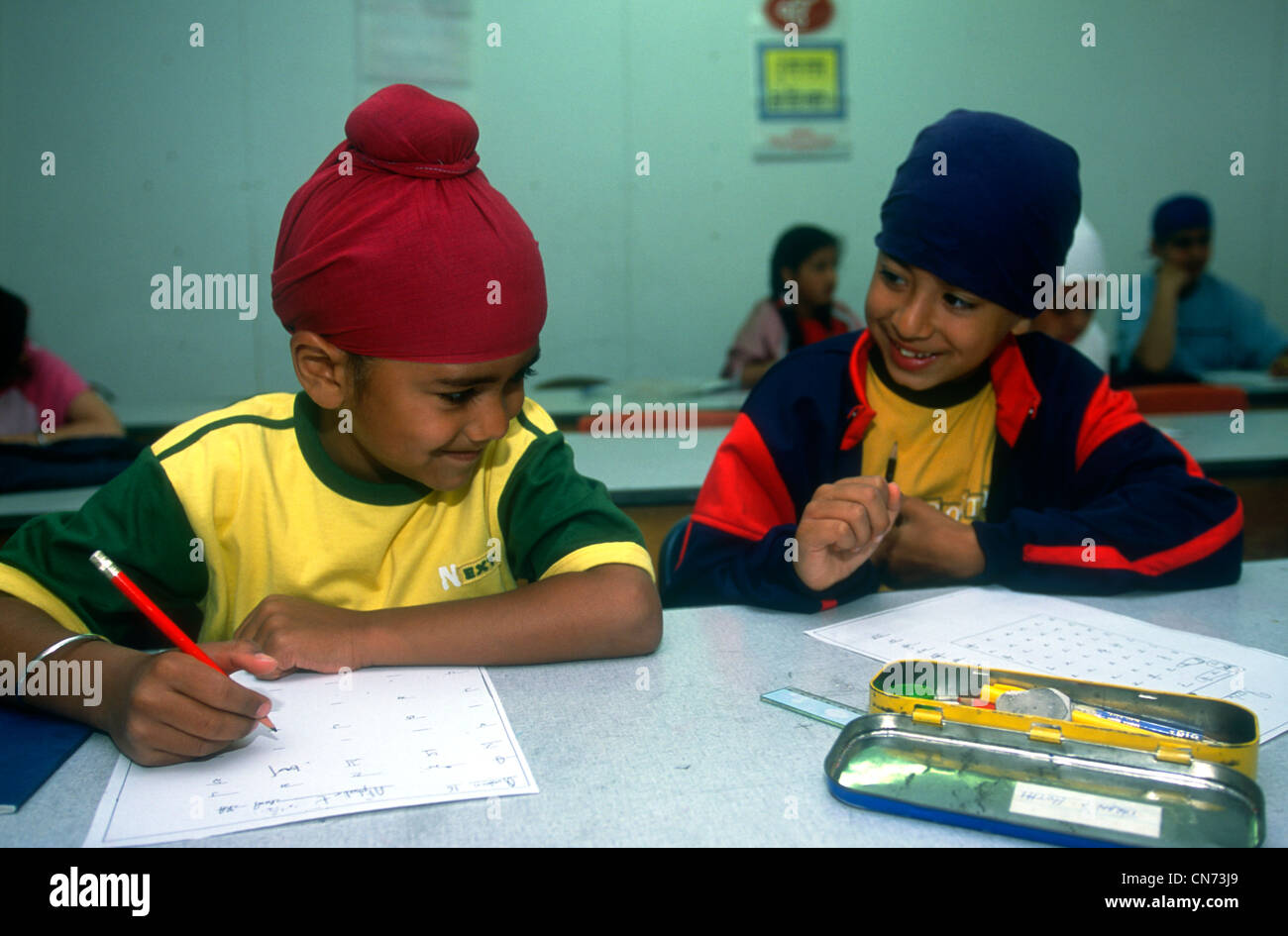 Sikh children in classroom at gurdwara learning Punjabi language, Sri ...