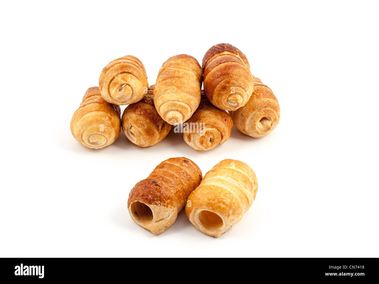 Small group of empty italian pastry, cannoli, on white background Stock ...