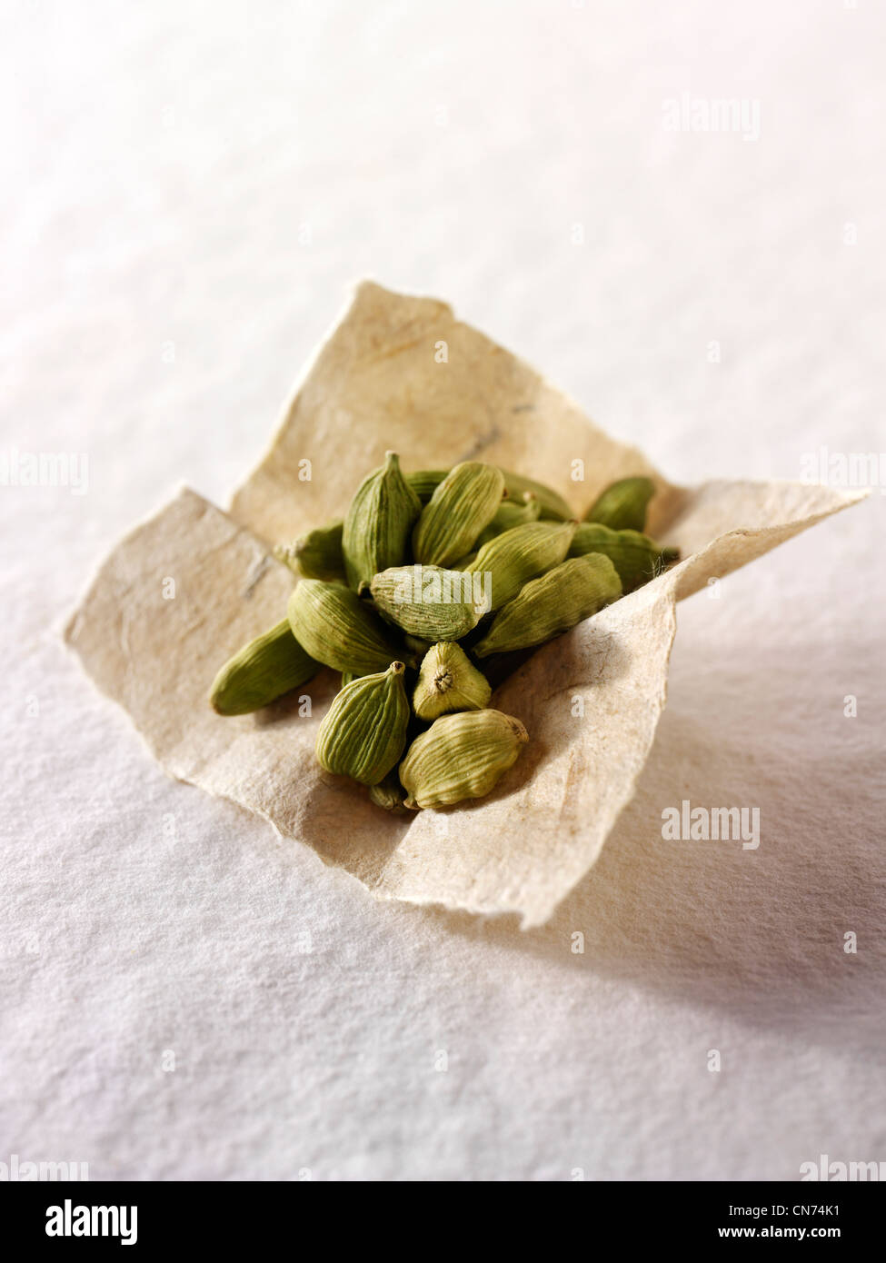 Green Cardamom seeds composed arrangement Stock Photo - Alamy