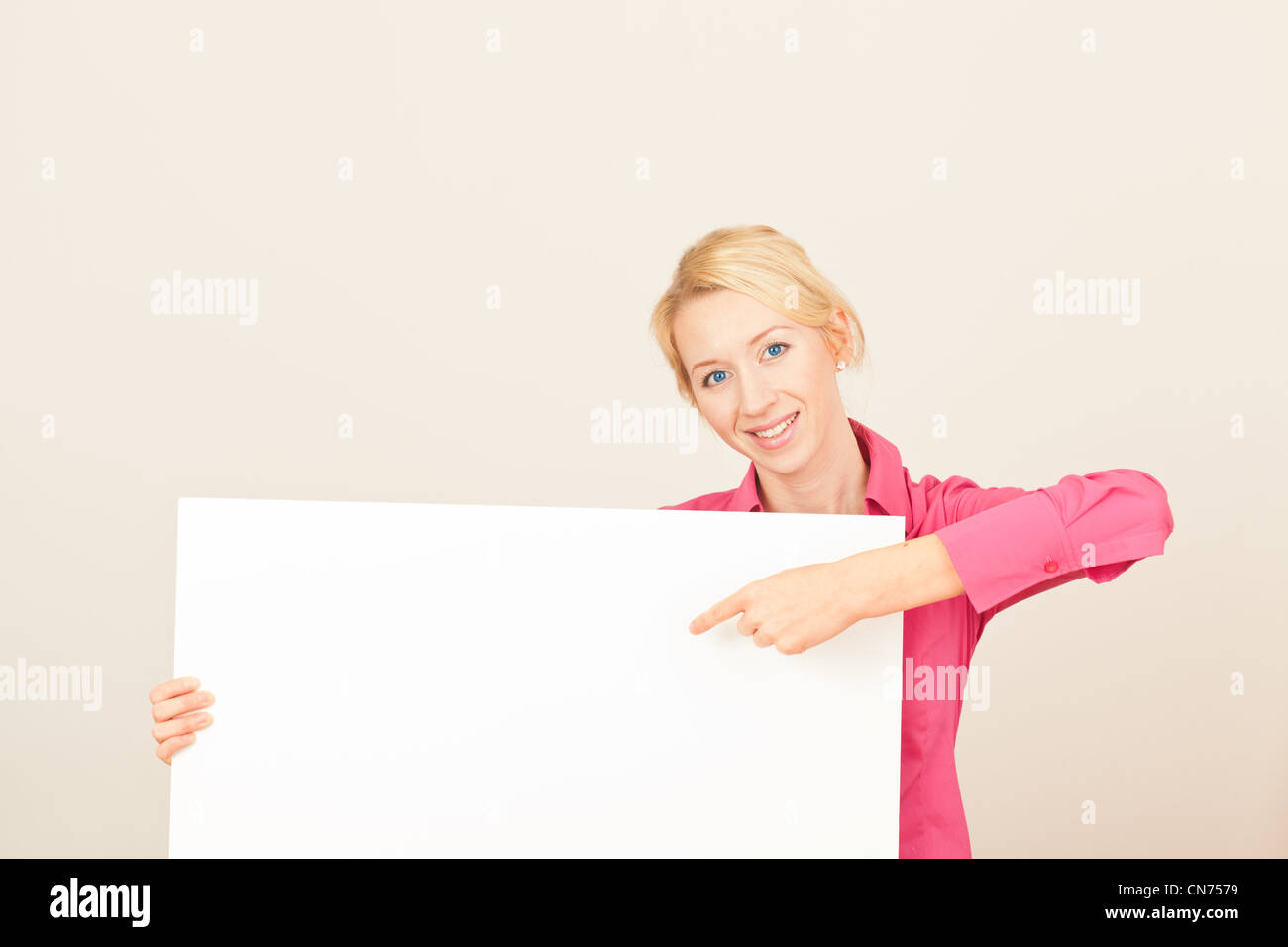 Woman hold poster hi-res stock photography and images - Alamy