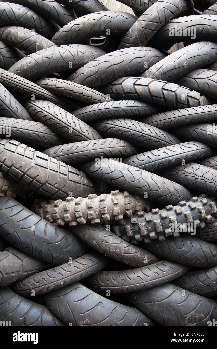 Motorbike Tyres stacked in a distribution centre Stock Photo - Alamy