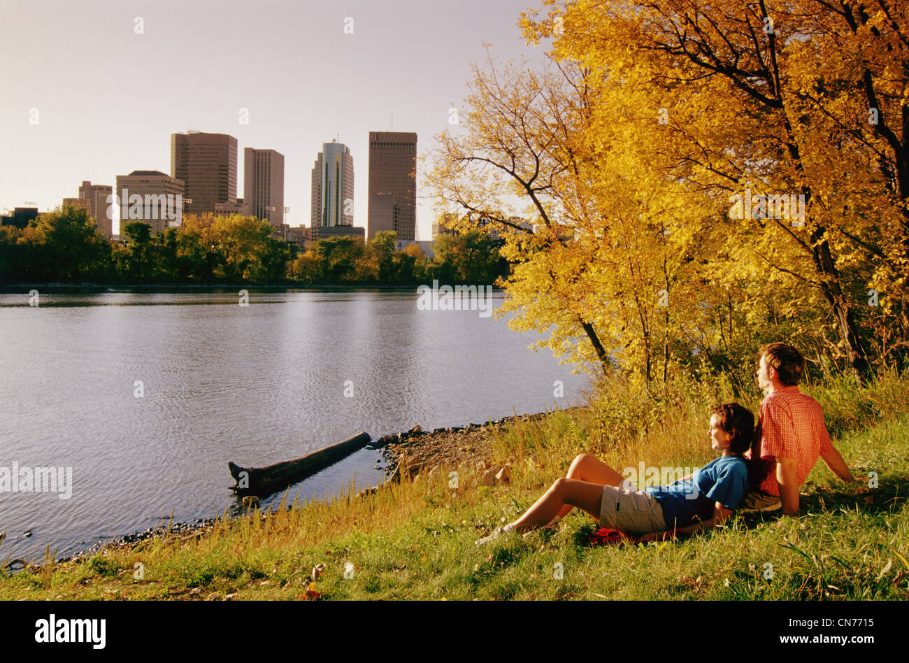 Couple Along Red River with Winnipeg Skyline, Manitoba Stock Photo - Alamy