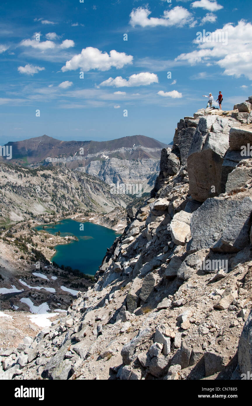 Hiker pointing out the sights from the summit of Eagle Cap in Oregon's ...