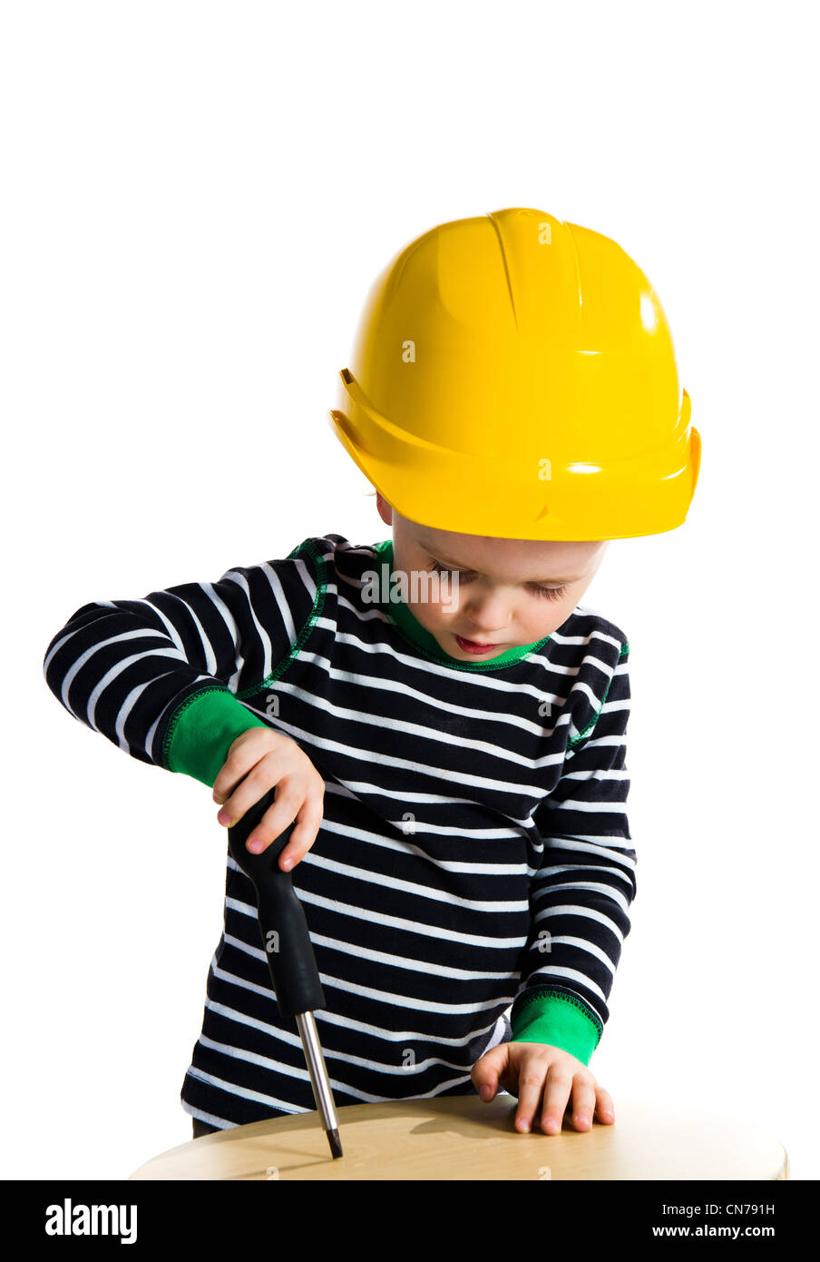 Little baby boy playing with screwdriver - isolated on white background ...