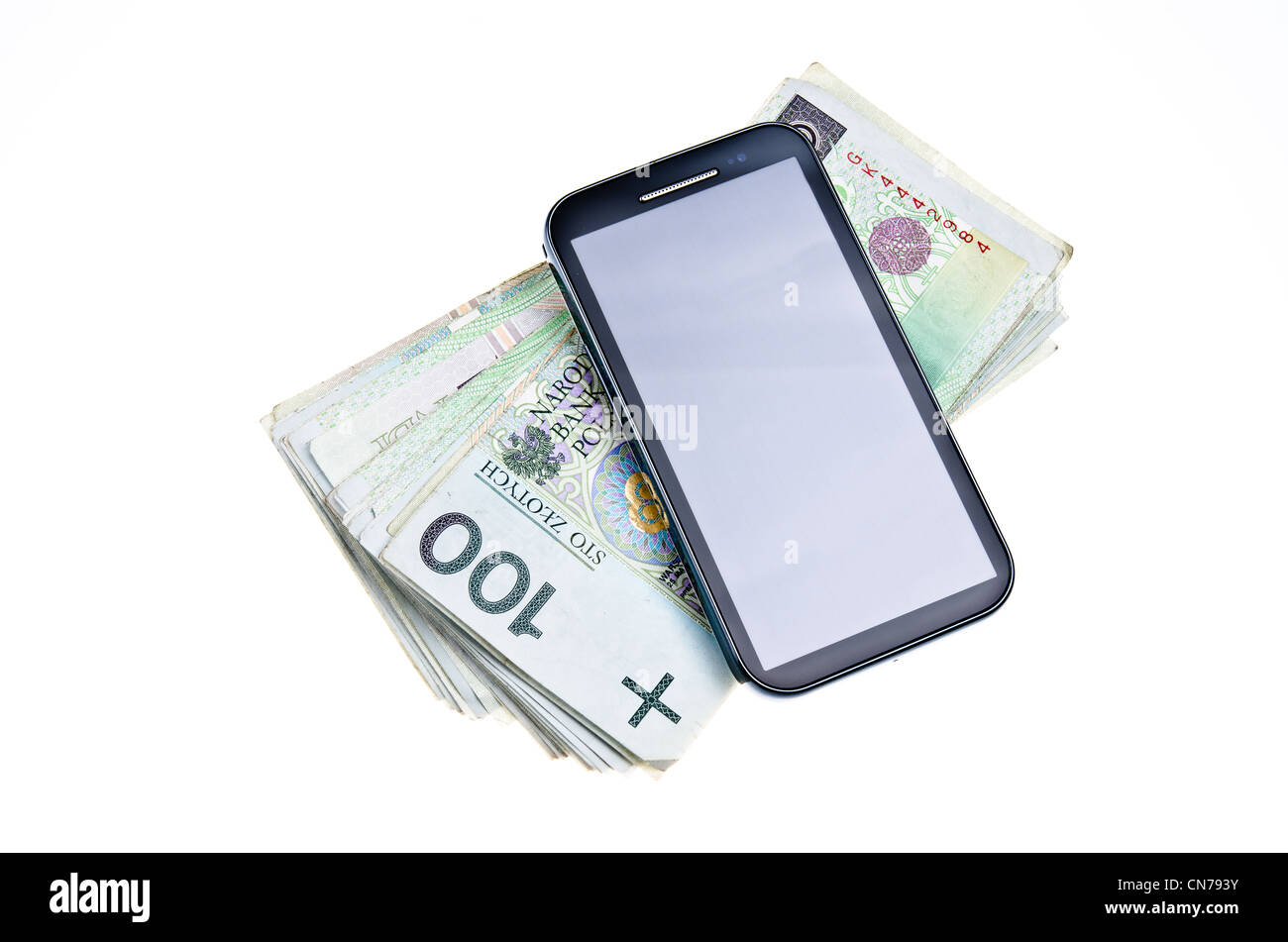 Modern touchscreen cell phone on stack of Polish money Stock Photo - Alamy