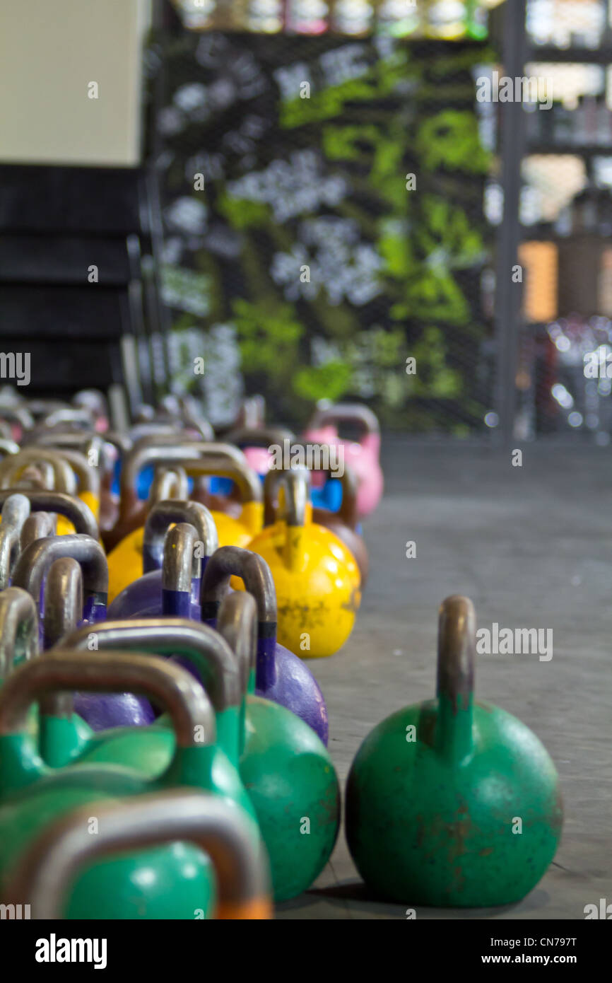Kettlebells in gym Stock Photo - Alamy