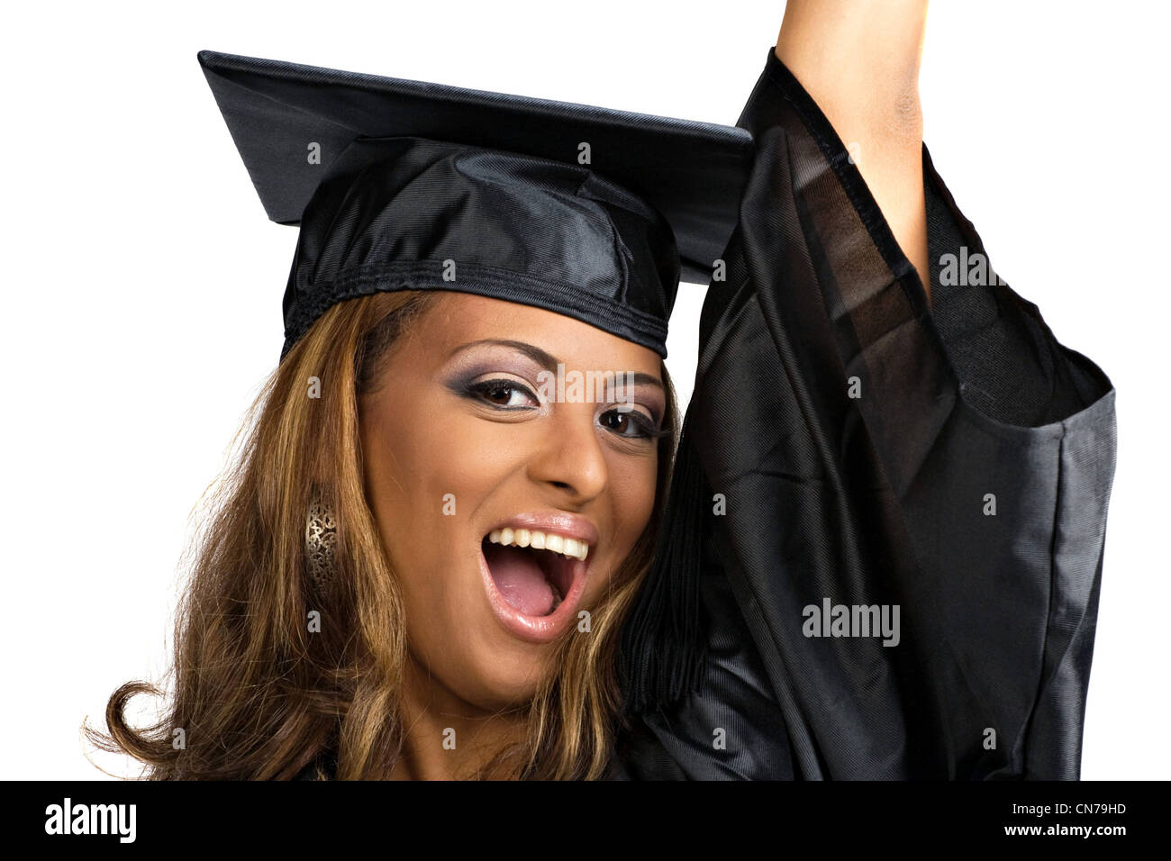 A happy graduate woman cheering happily in celebration of her recent ...