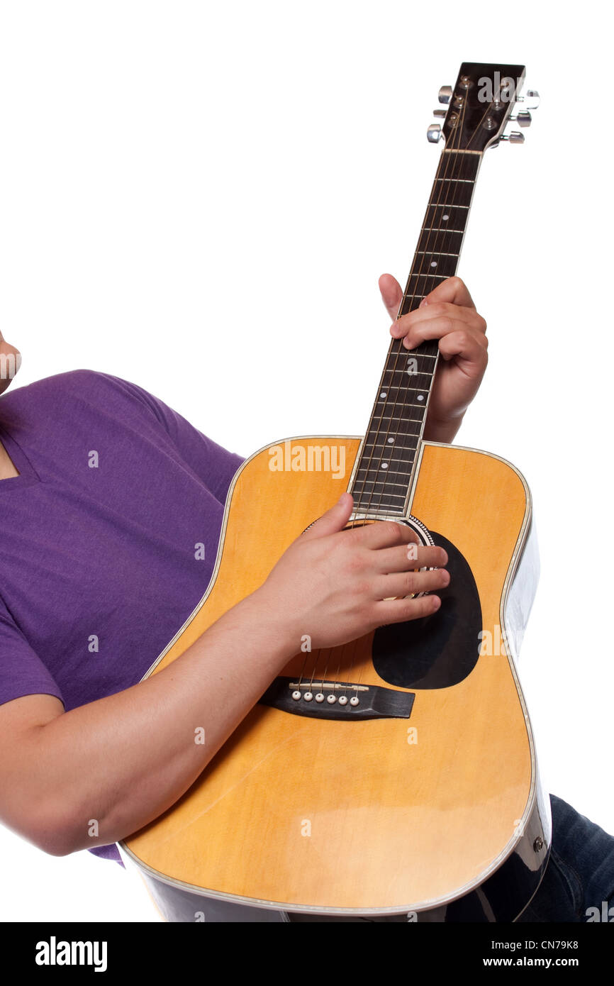 Closeup of a mans hands strumming and electric acoustic guitar isolated ...