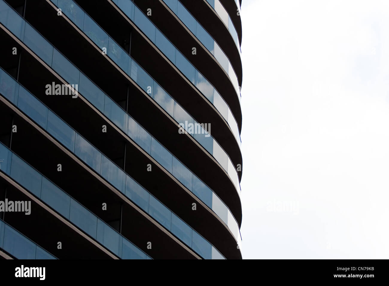Closeup detail of the windows at the corner of a modern high rise ...
