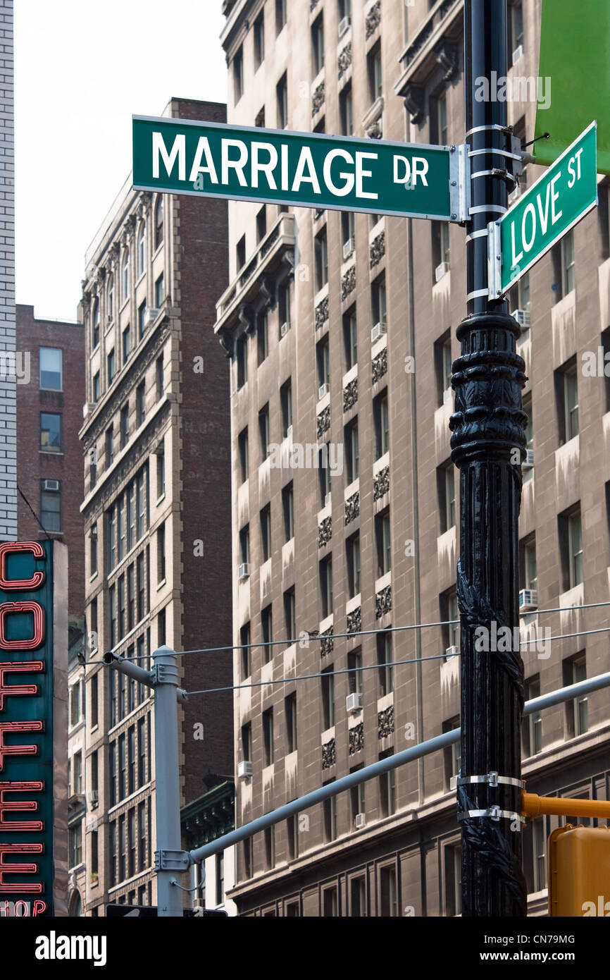 Intersection street signs of marriage dr and love st Stock Photo - Alamy