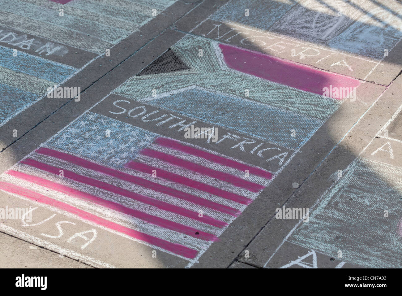 Chalk pavement drawing of flags of Usa and South Africa at the South ...
