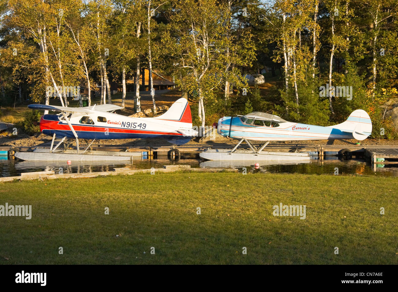 Two float planes Sit on Moosehead Lake near Greenville Maine Stock ...