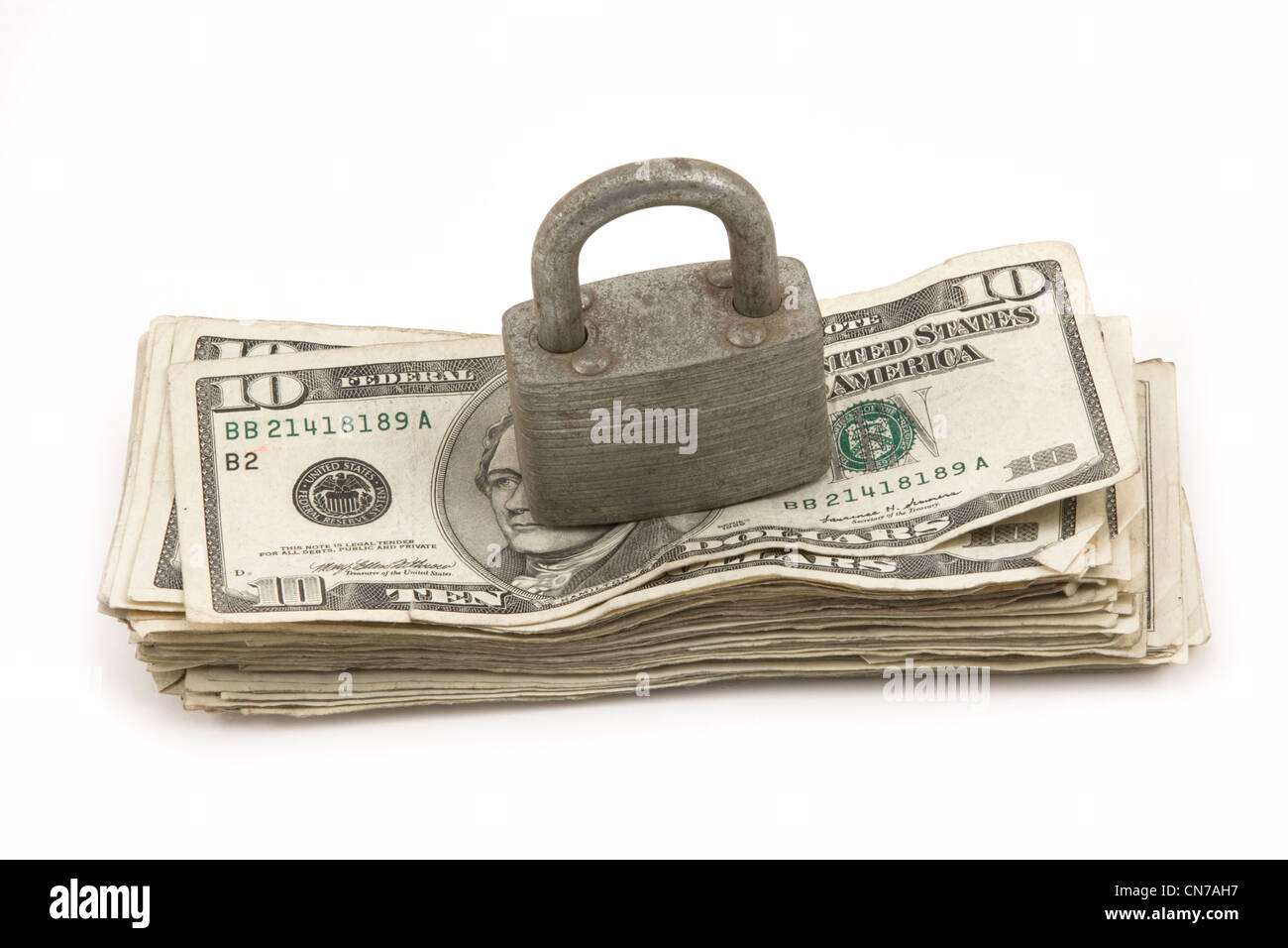American Money and lock isolated on white background Stock Photo - Alamy
