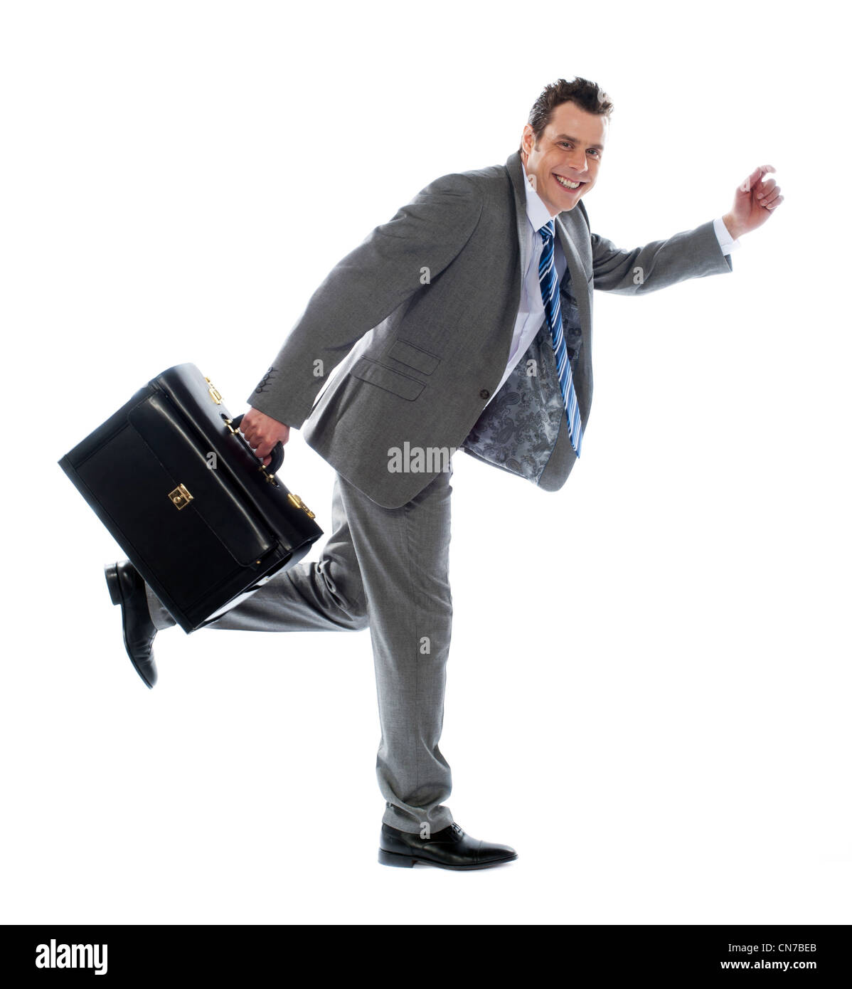 Full length portrait of a businessman running away against white ...