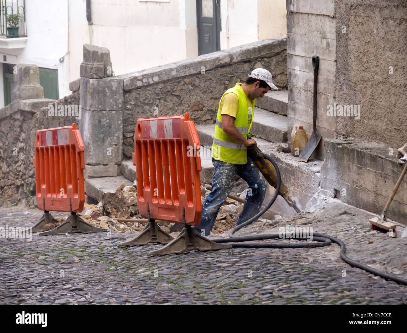 Construction worker with a jackhammer at a construction site Stock ...