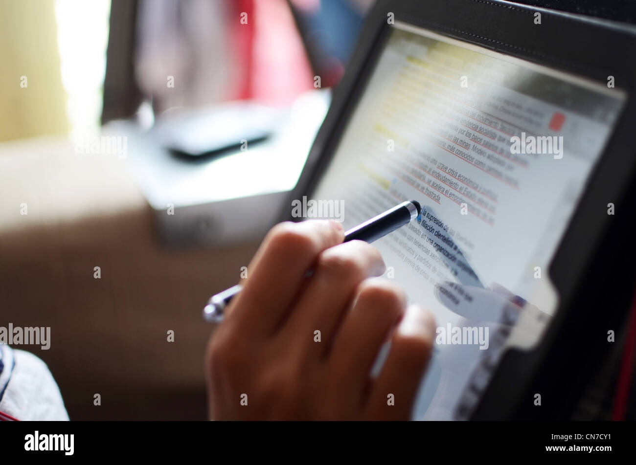 College student using tablet hi-res stock photography and images - Alamy