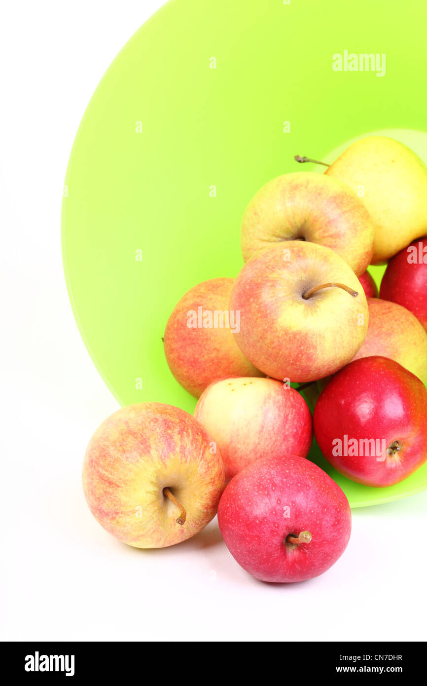 Fresh green, red apples in basket isolated over white background Stock ...