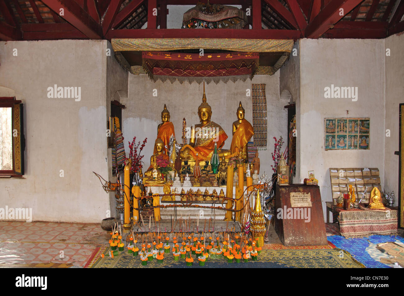 Interior of Wat Tham Phou Si Buddhist shrine on Mount Phou Si, Luang ...