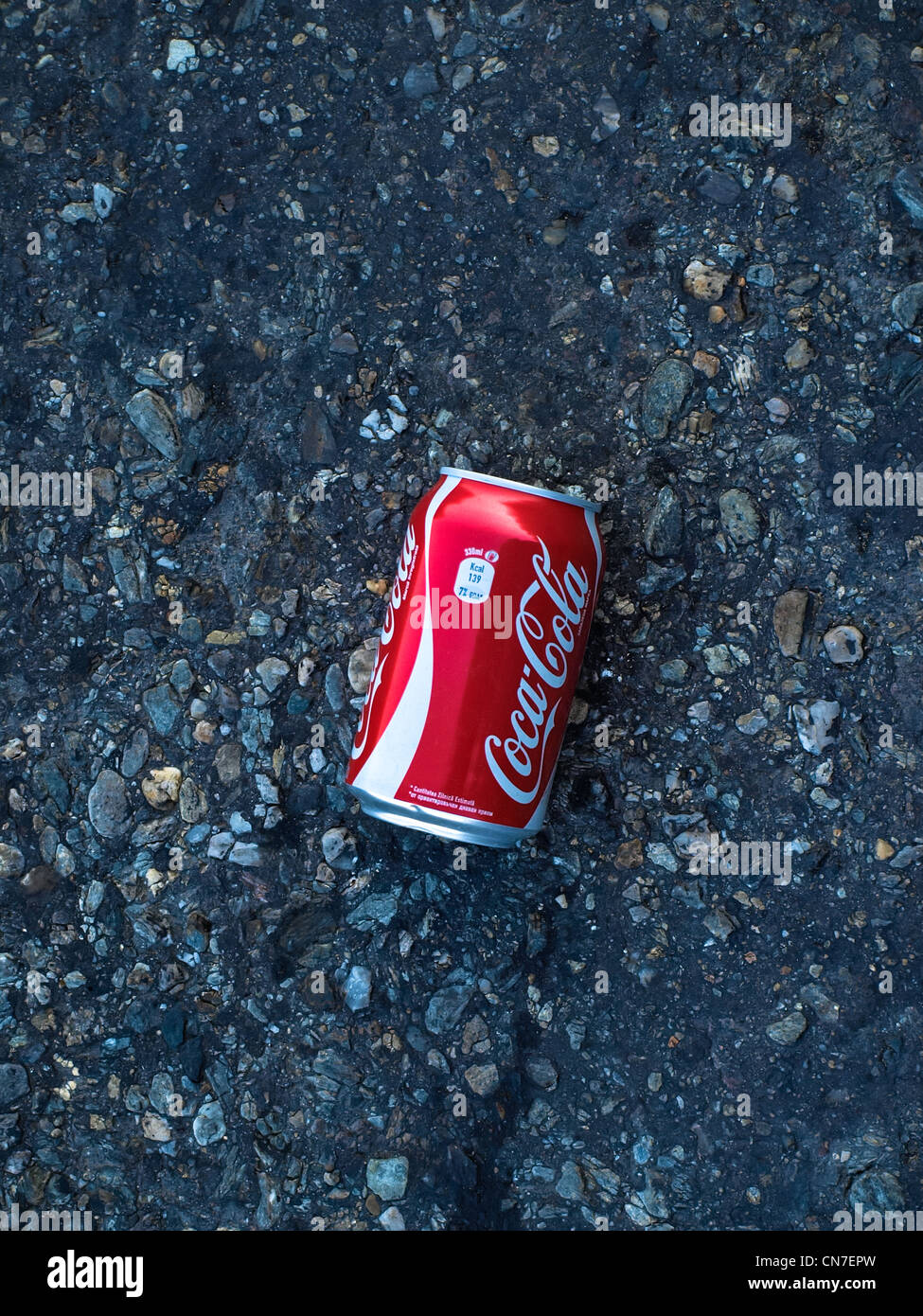 Coca Cola on tarmac, asphalt Stock Photo - Alamy