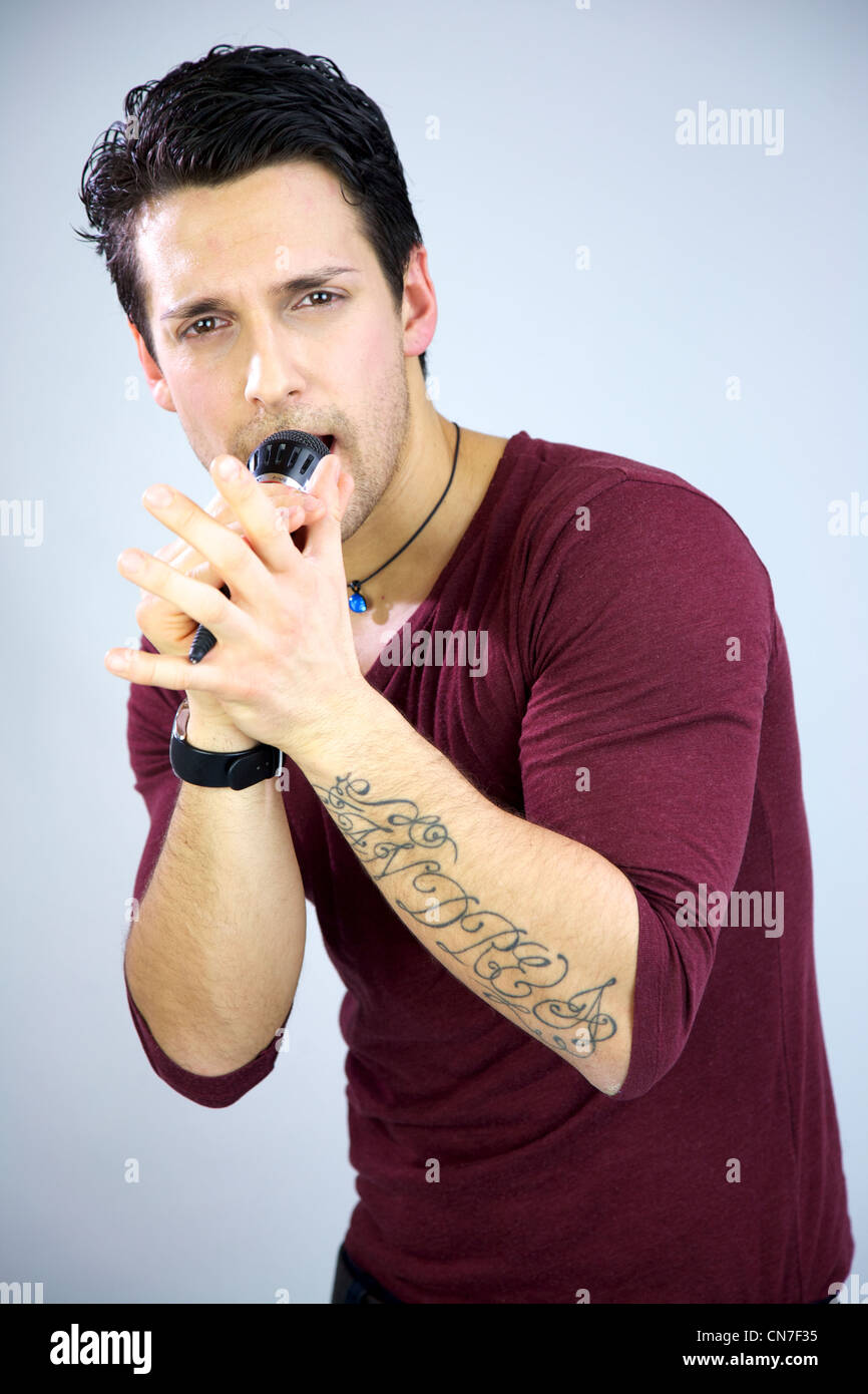 Male model singing Stock Photo - Alamy