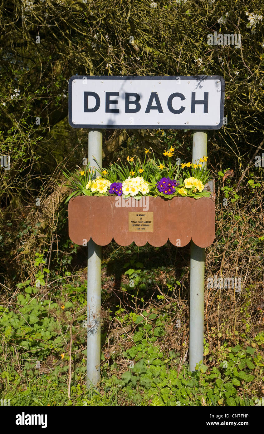 Village sign with pretty flower box Debach, Suffolk, England Stock ...