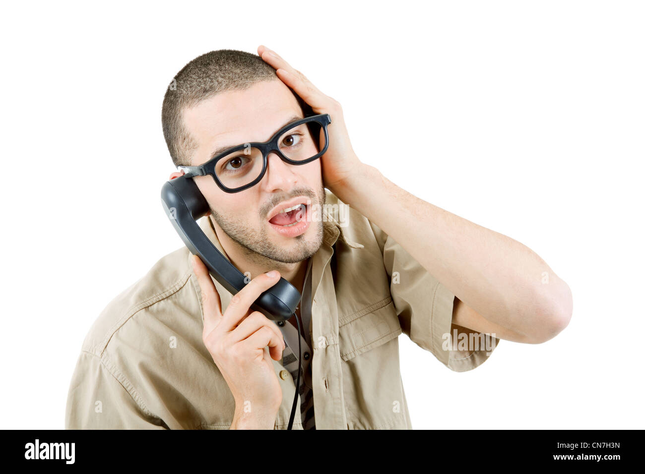 young man with a phone, isolated on white Stock Photo - Alamy