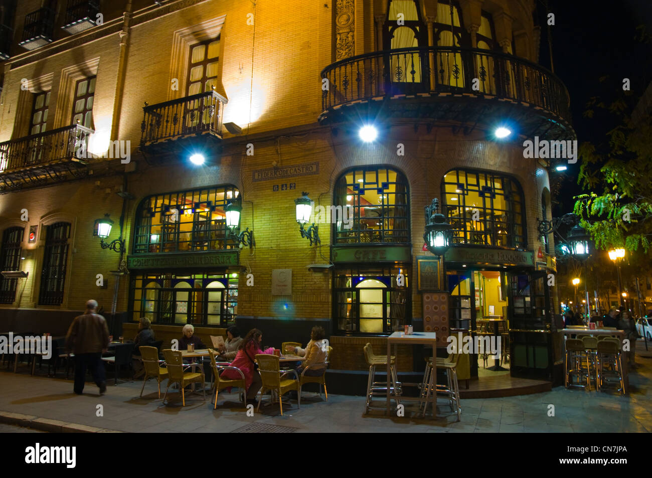 Cafe terrace at night central Seville Andalusia Spain Stock Photo - Alamy
