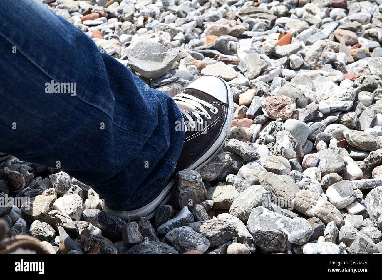 shoes and stones Stock Photo - Alamy