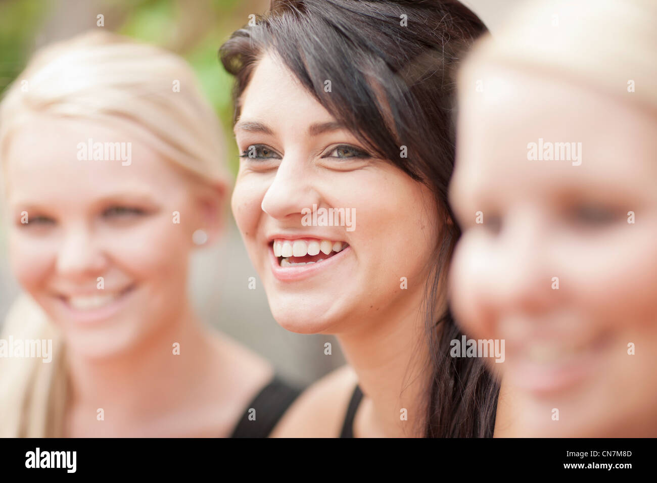 Women smiling together Stock Photo - Alamy