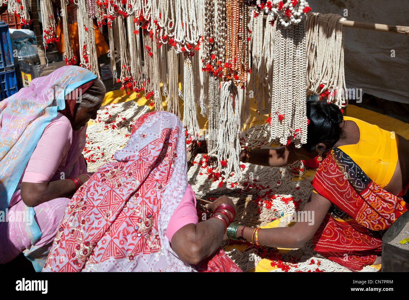 Indian women buying traditional collars. Nasik. India Stock Photo - Alamy