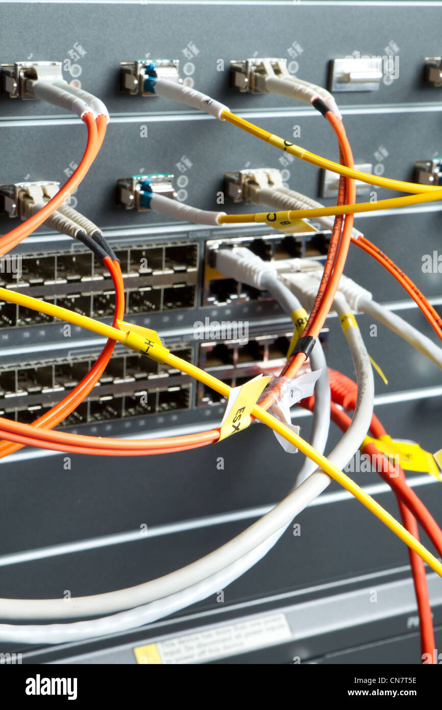 optic fiber cables connected to data center Stock Photo - Alamy
