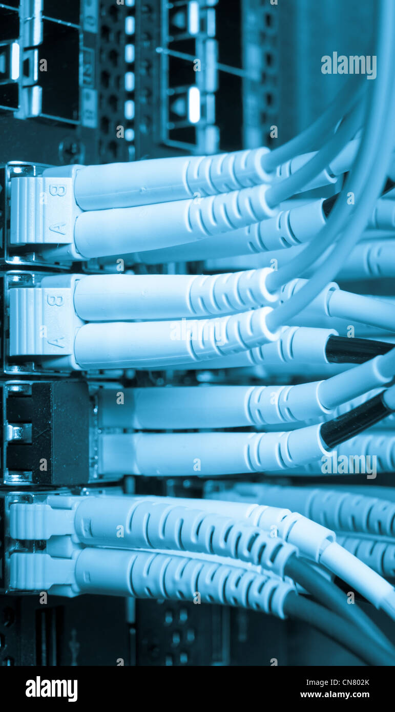 optic fiber cables connected to data center Stock Photo - Alamy