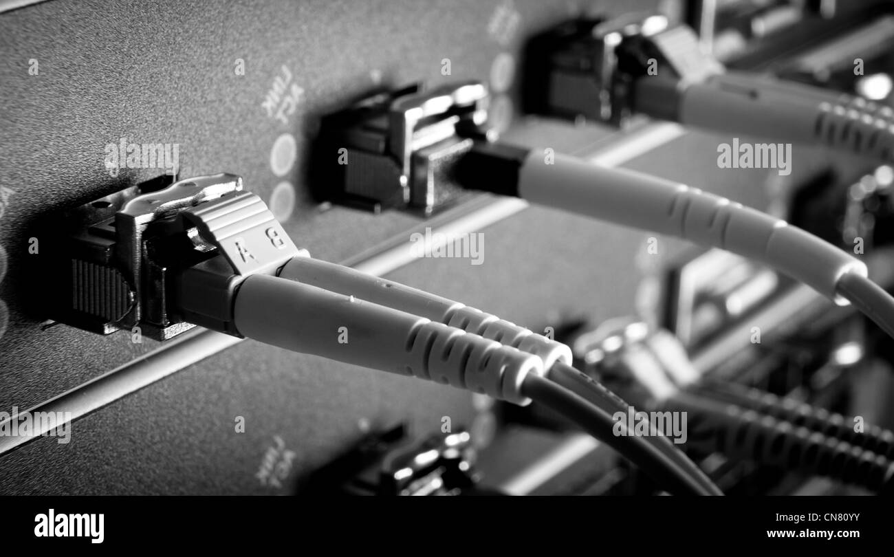 optic fiber cables connected to data center Stock Photo - Alamy