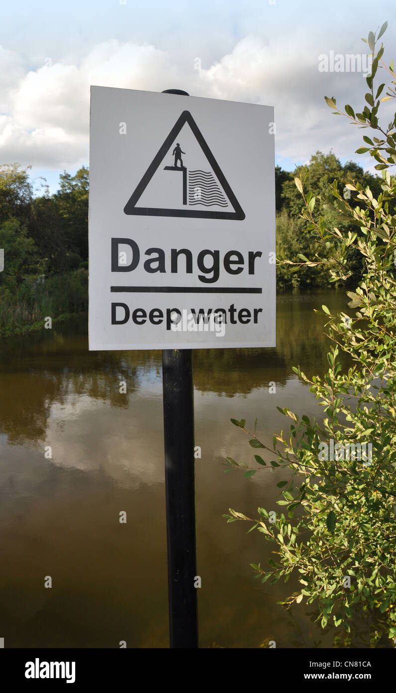 Danger deep water sign at Little Common Pond, Wood Lane, Stanmore Stock ...