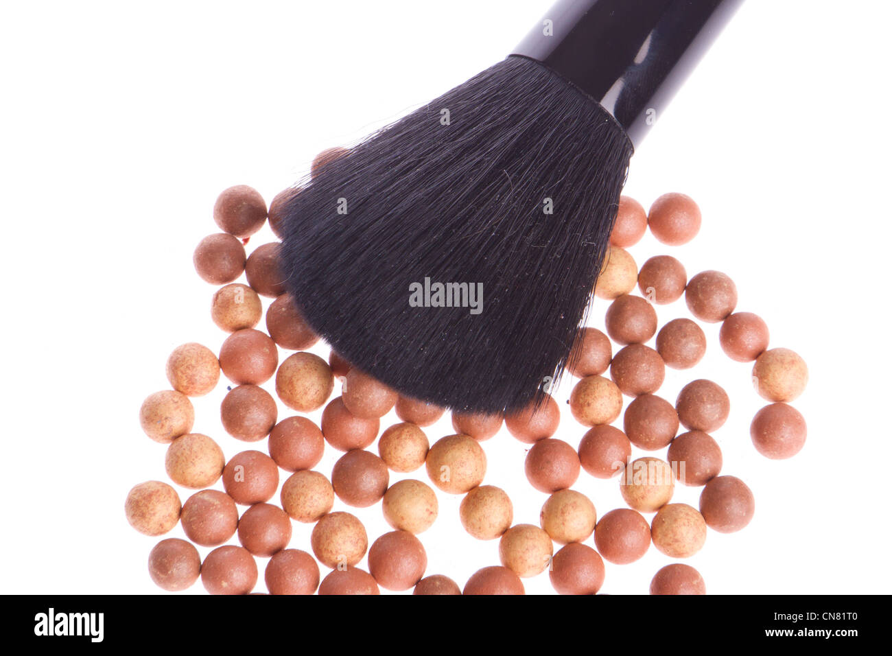 bronzing pearls isolated on white background Stock Photo - Alamy