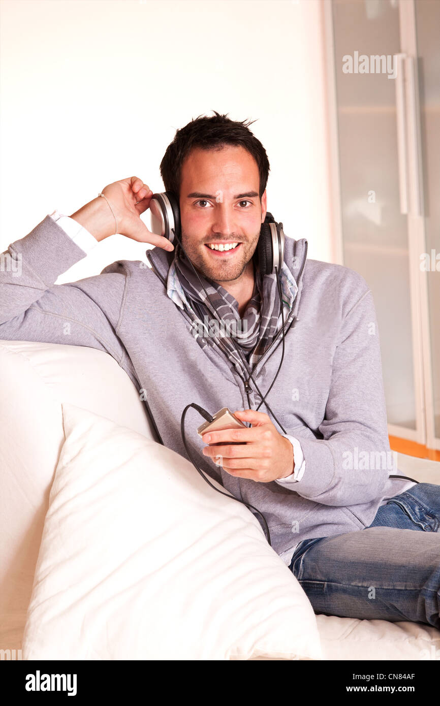 young man with headphones Stock Photo - Alamy