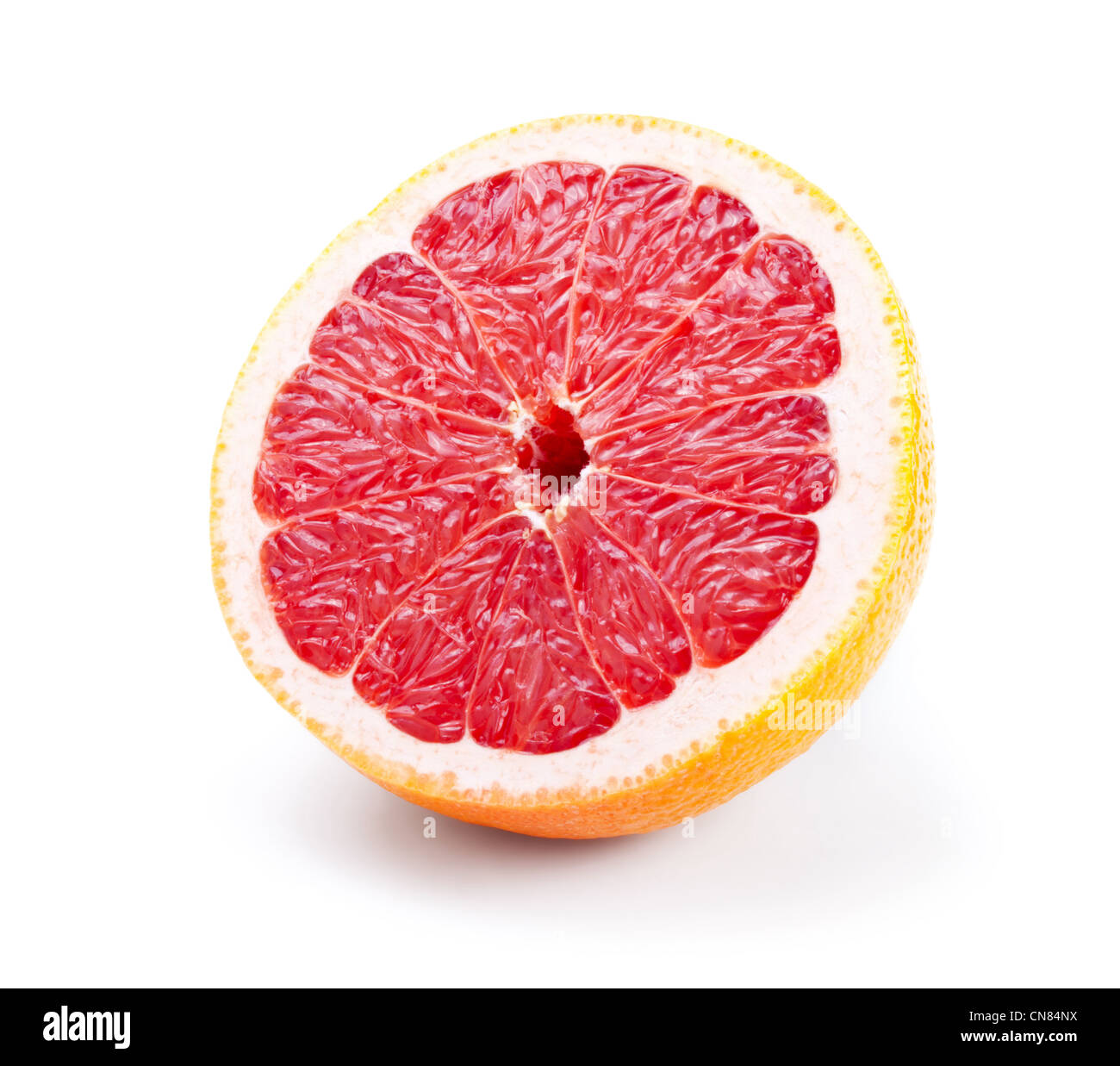 half of grapefruit isolated on white background Stock Photo - Alamy