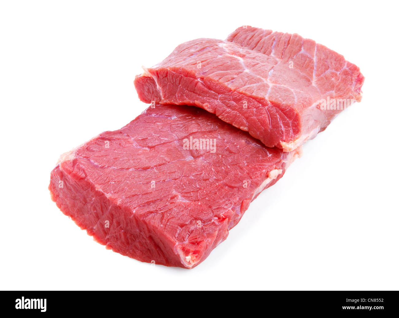 Raw beef meat isolated on white background Stock Photo - Alamy
