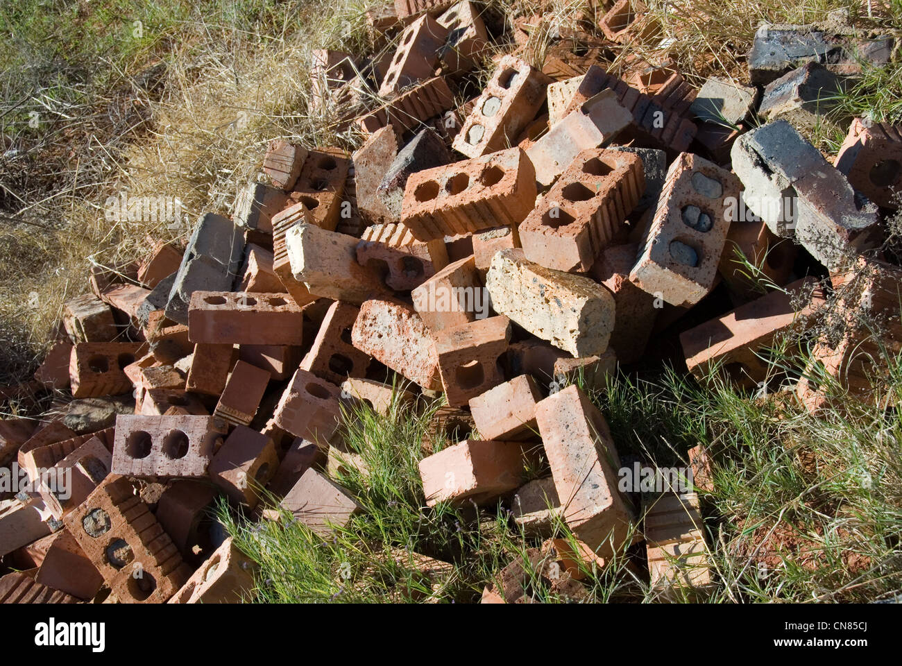 Pile of discarded building bricks on a construction site Stock Photo ...