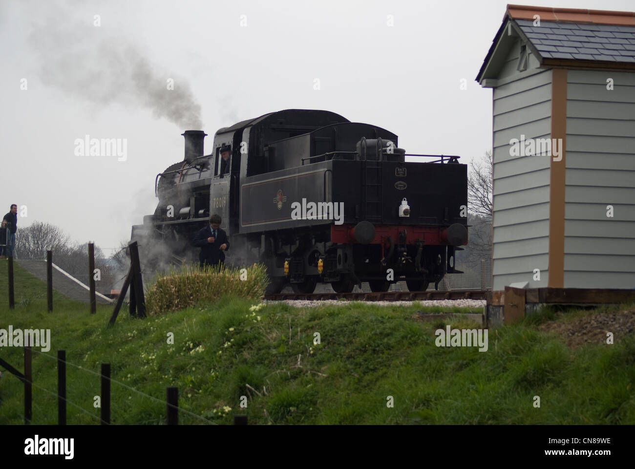 Standing tall an engine in steam Stock Photo - Alamy