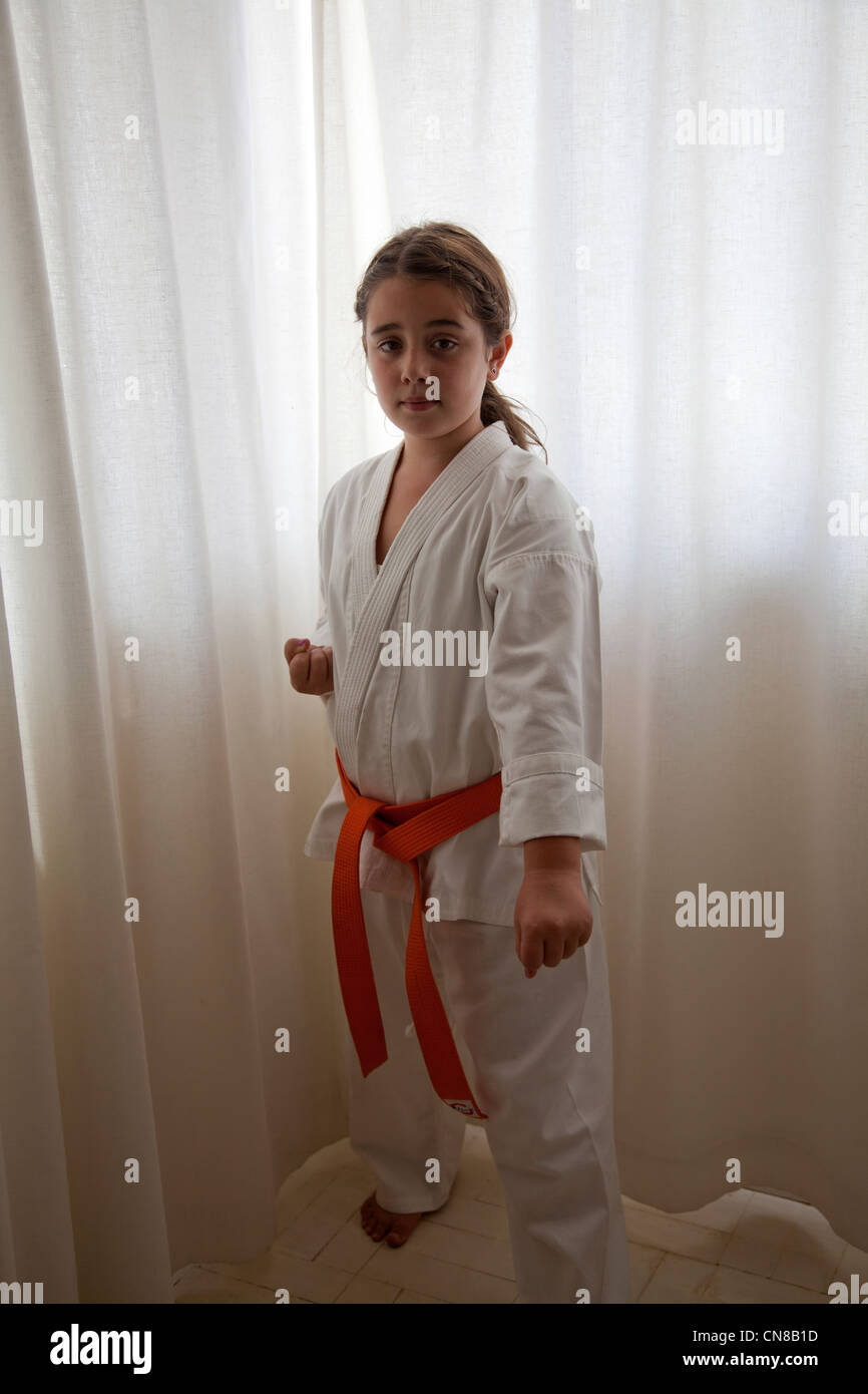 Girl in Karate Outfit Stock Photo - Alamy