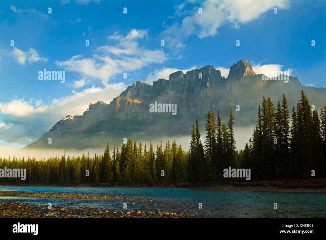 Mist rising from Bow river early morning at castle Junction Bow Valley ...