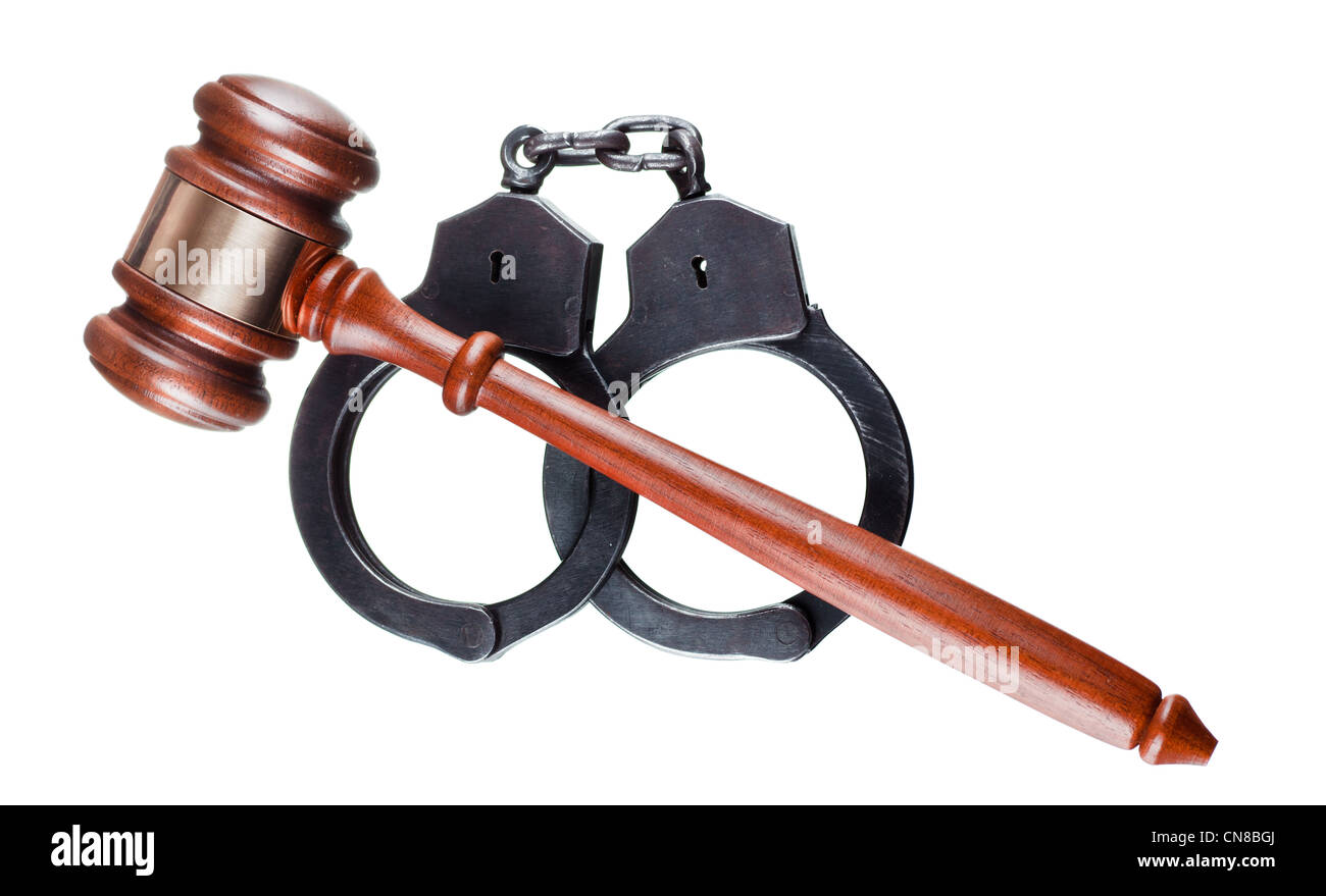 Gavel and handcuffs isolated on white Stock Photo - Alamy