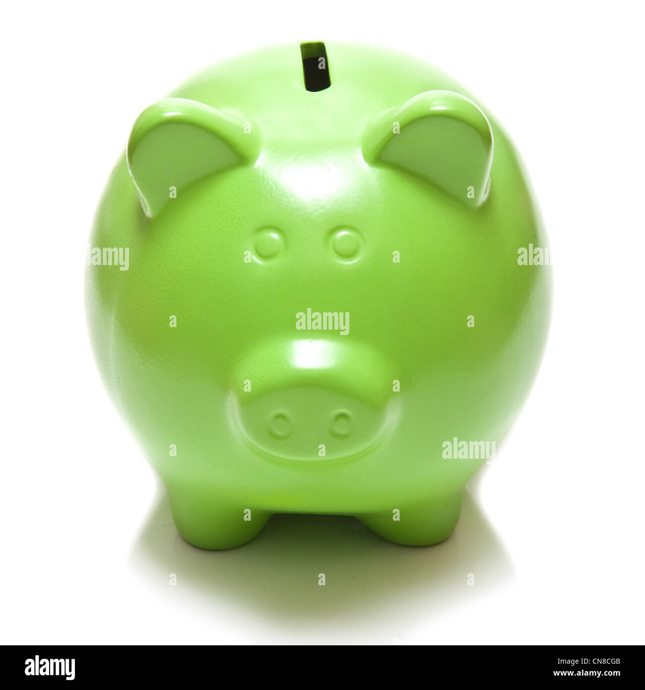Green piggy bank money box isolated on a white studio background Stock ...